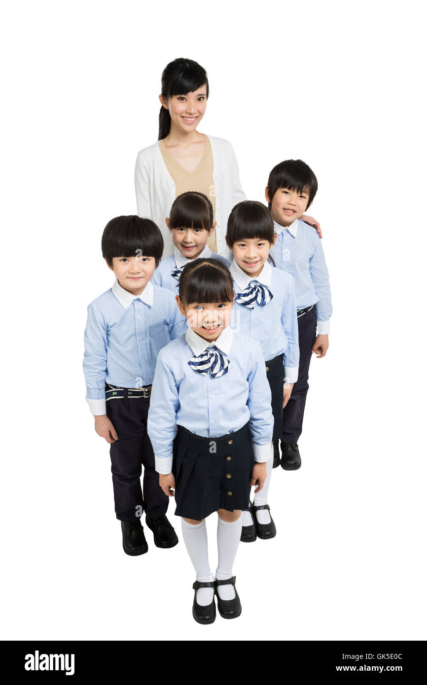 Teachers and children stand Stock Photo - Alamy