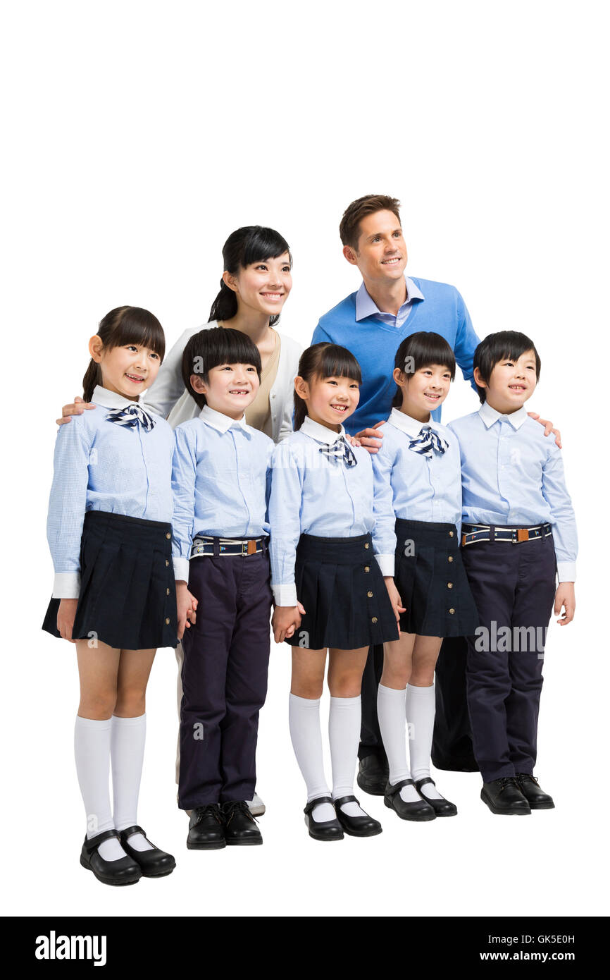Teachers and children stand Stock Photo - Alamy