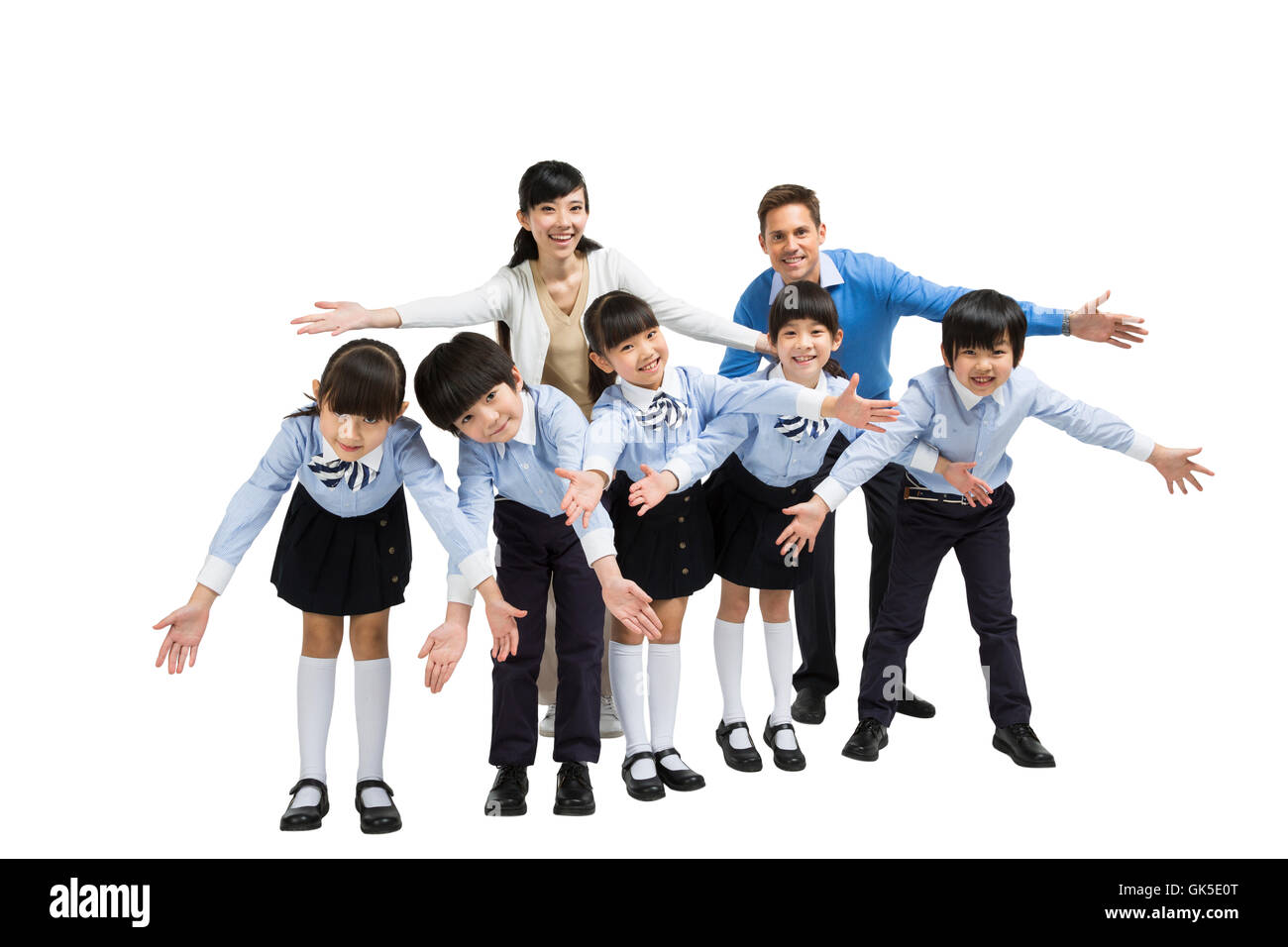 Teachers and children stand Stock Photo - Alamy
