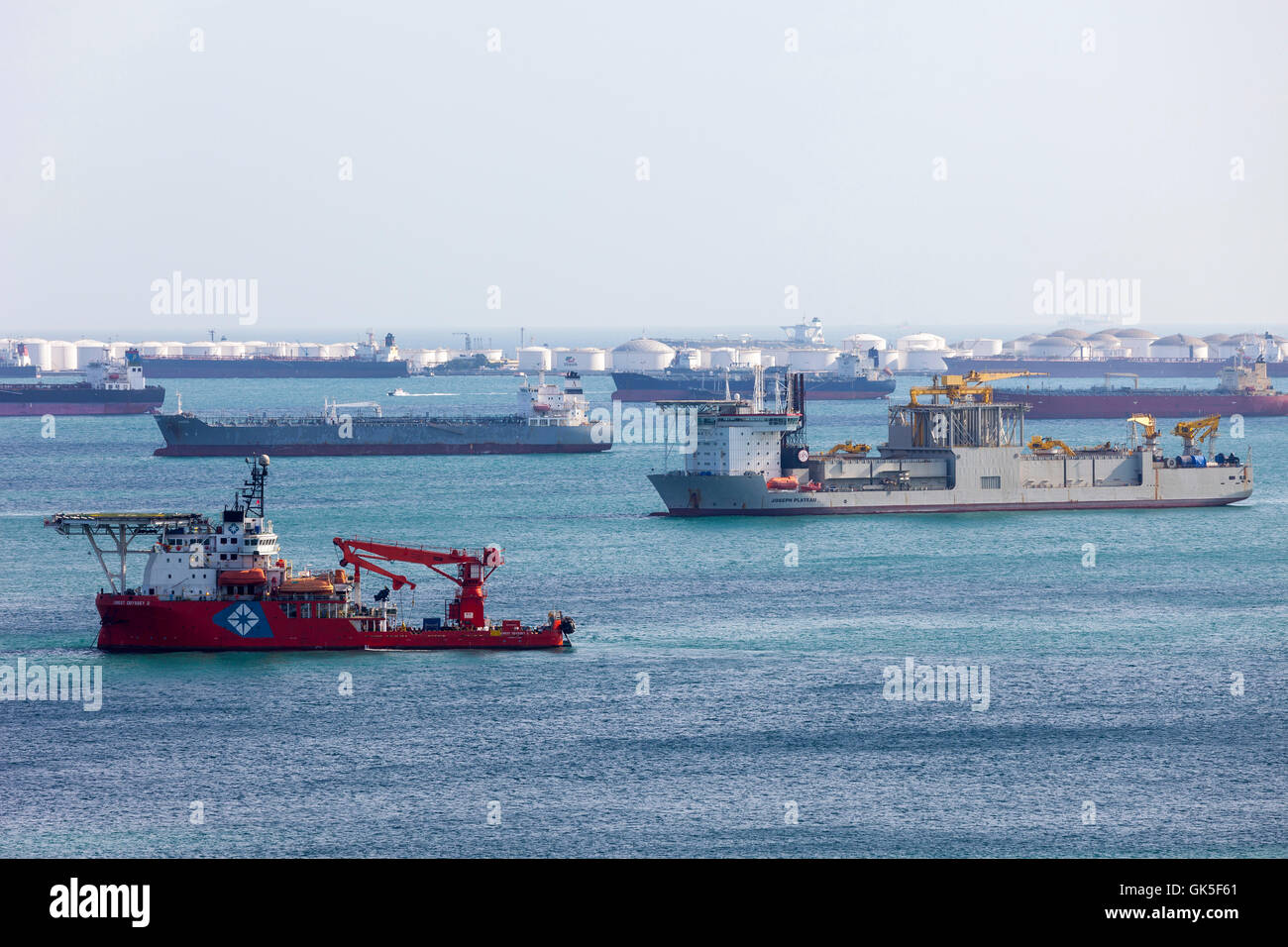 Commercial cargo ship at the anchorage to wait in a large collection of ...