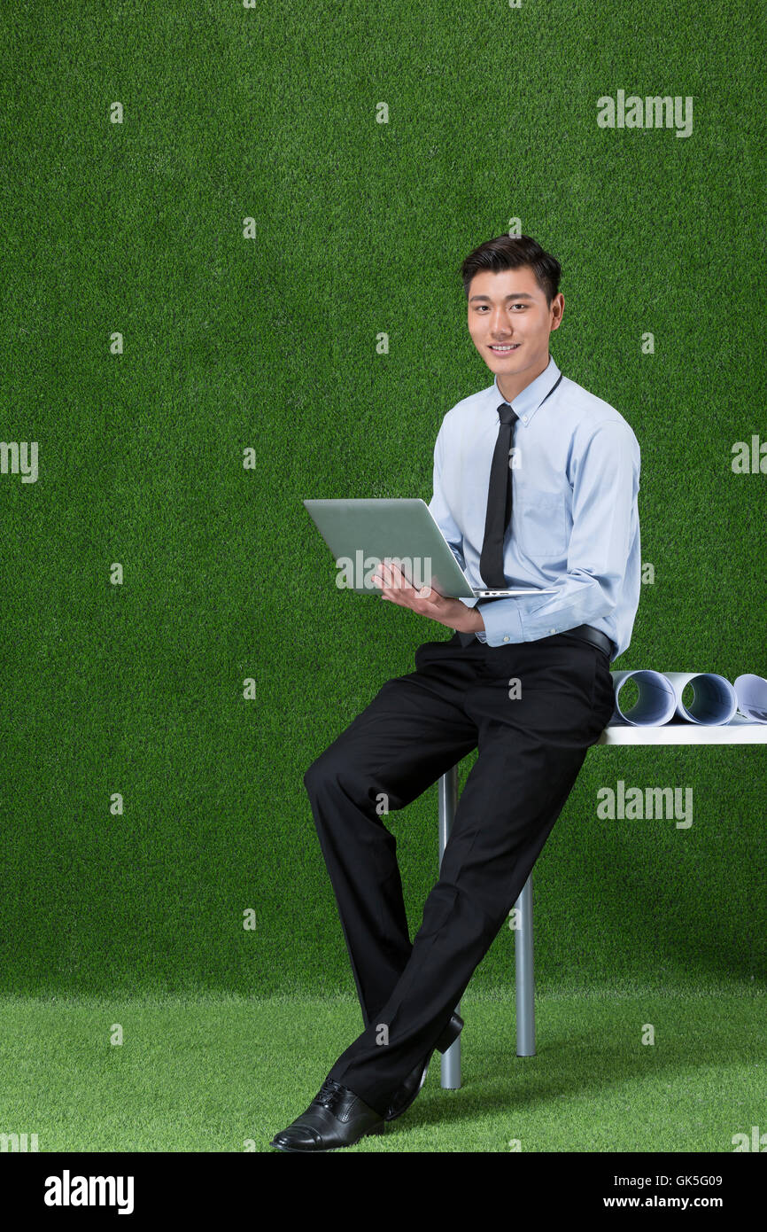 Grass business men designer Stock Photo - Alamy