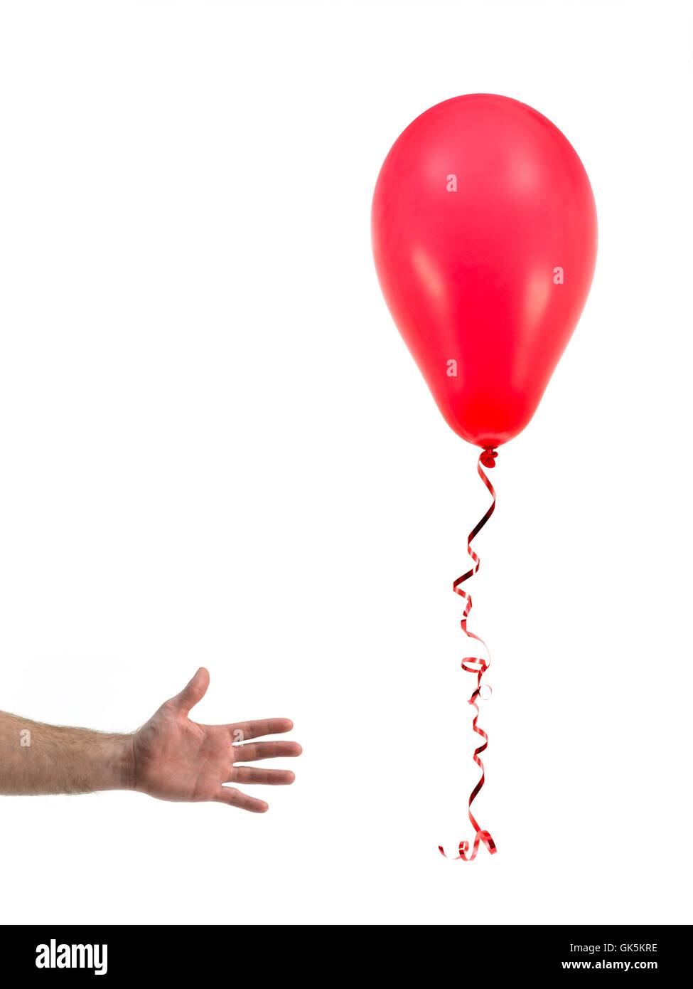 Balloon hand hold grab hi-res stock photography and images - Alamy