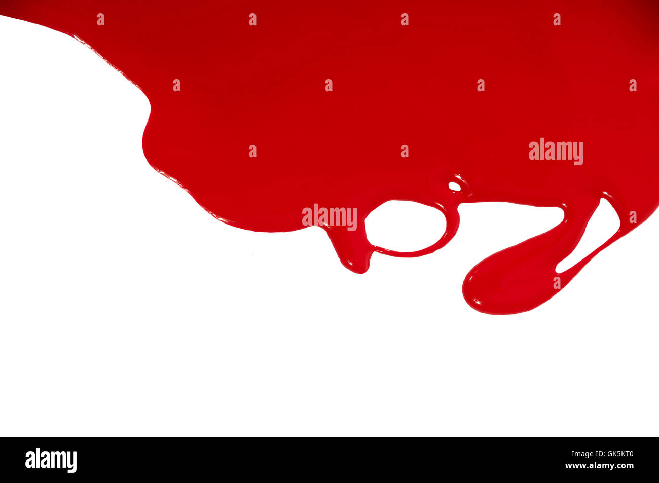 Red flowing paint Stock Photo - Alamy