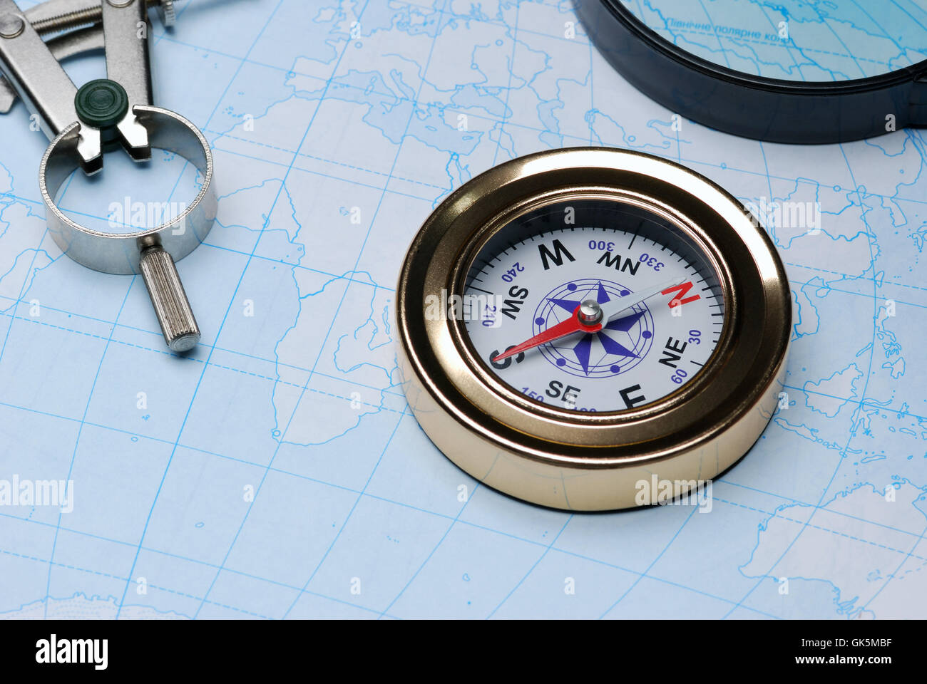 Compass and card Stock Photo - Alamy