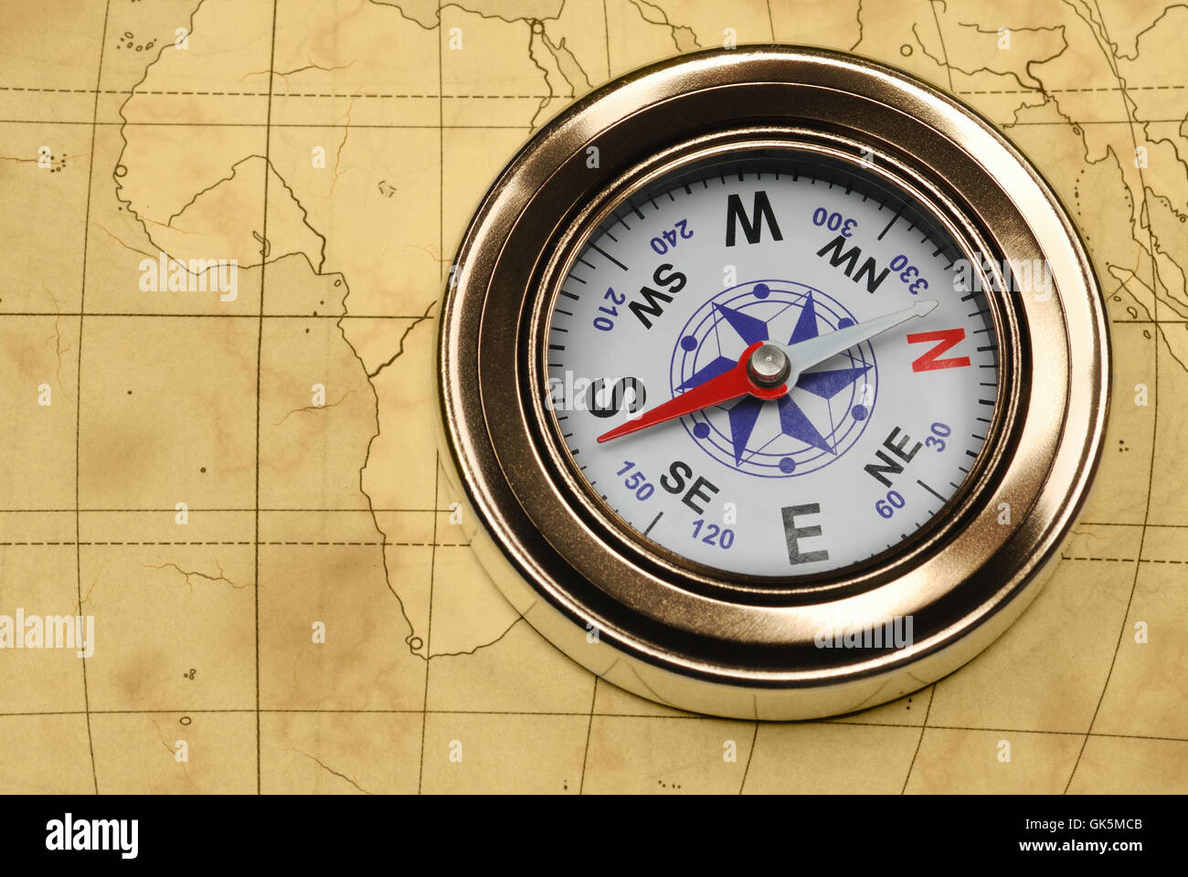 Ancient compass and map Stock Photo - Alamy