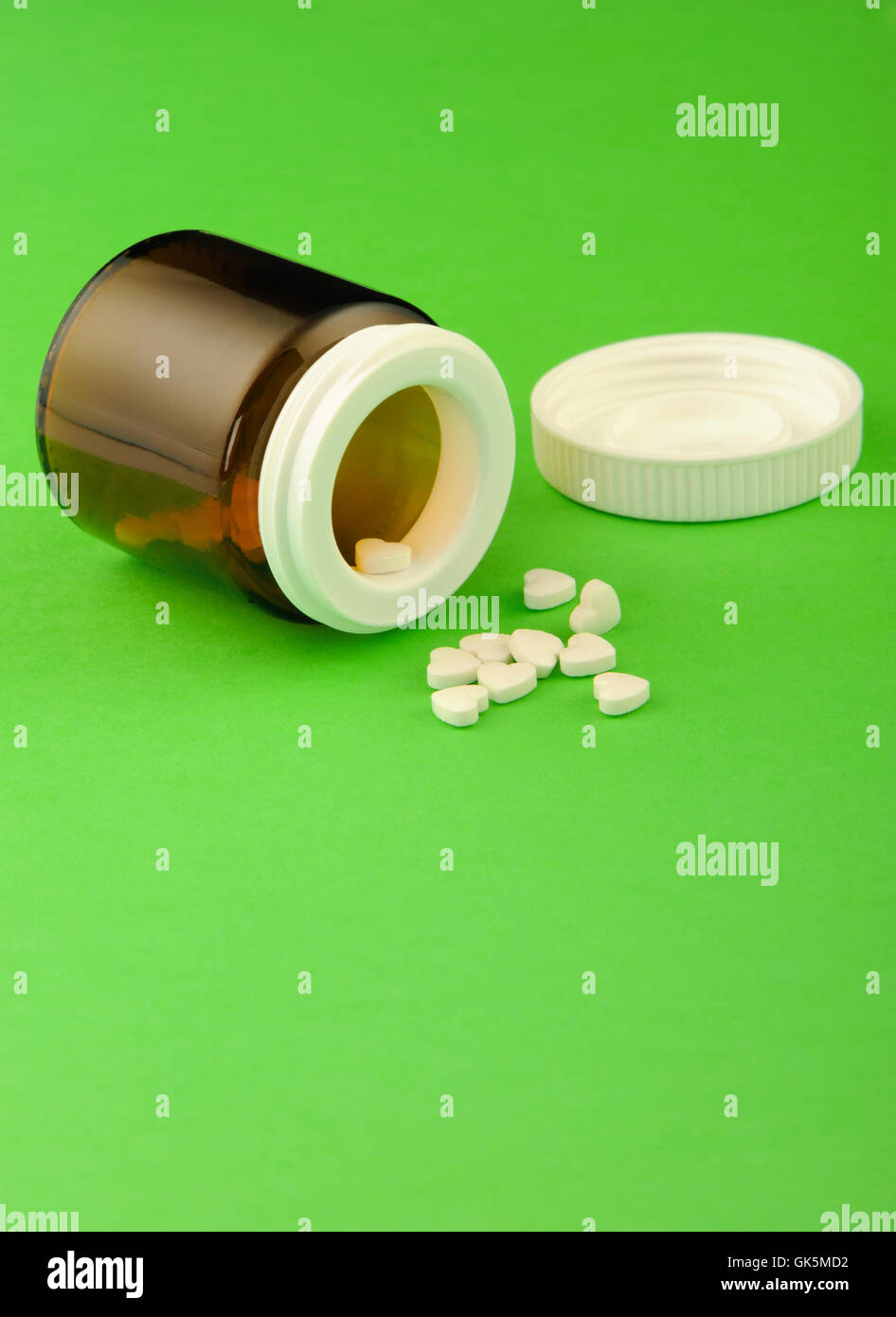 Tablets in the form of heart Stock Photo - Alamy