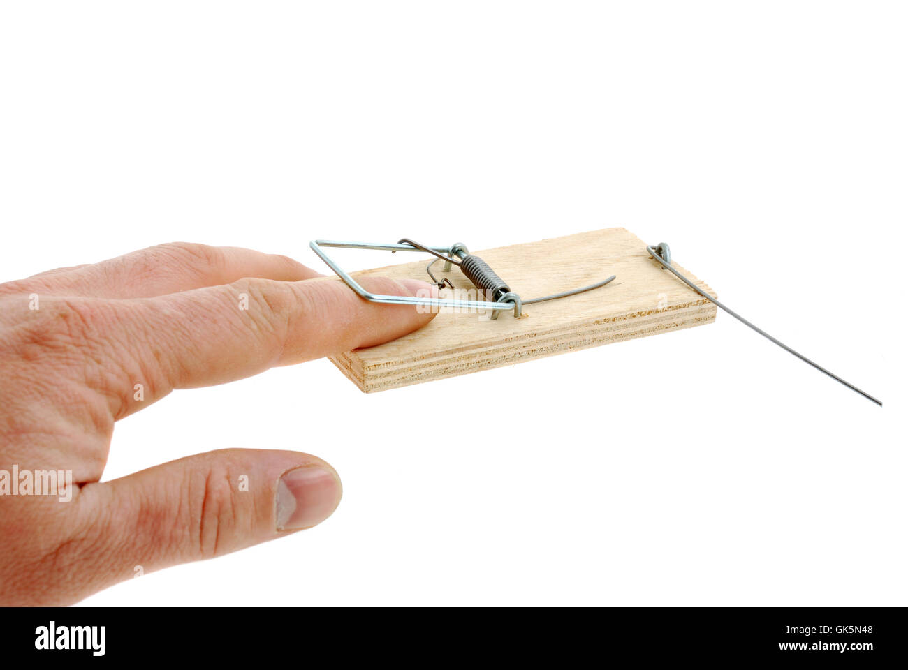 Finger in a mousetrap Stock Photo - Alamy