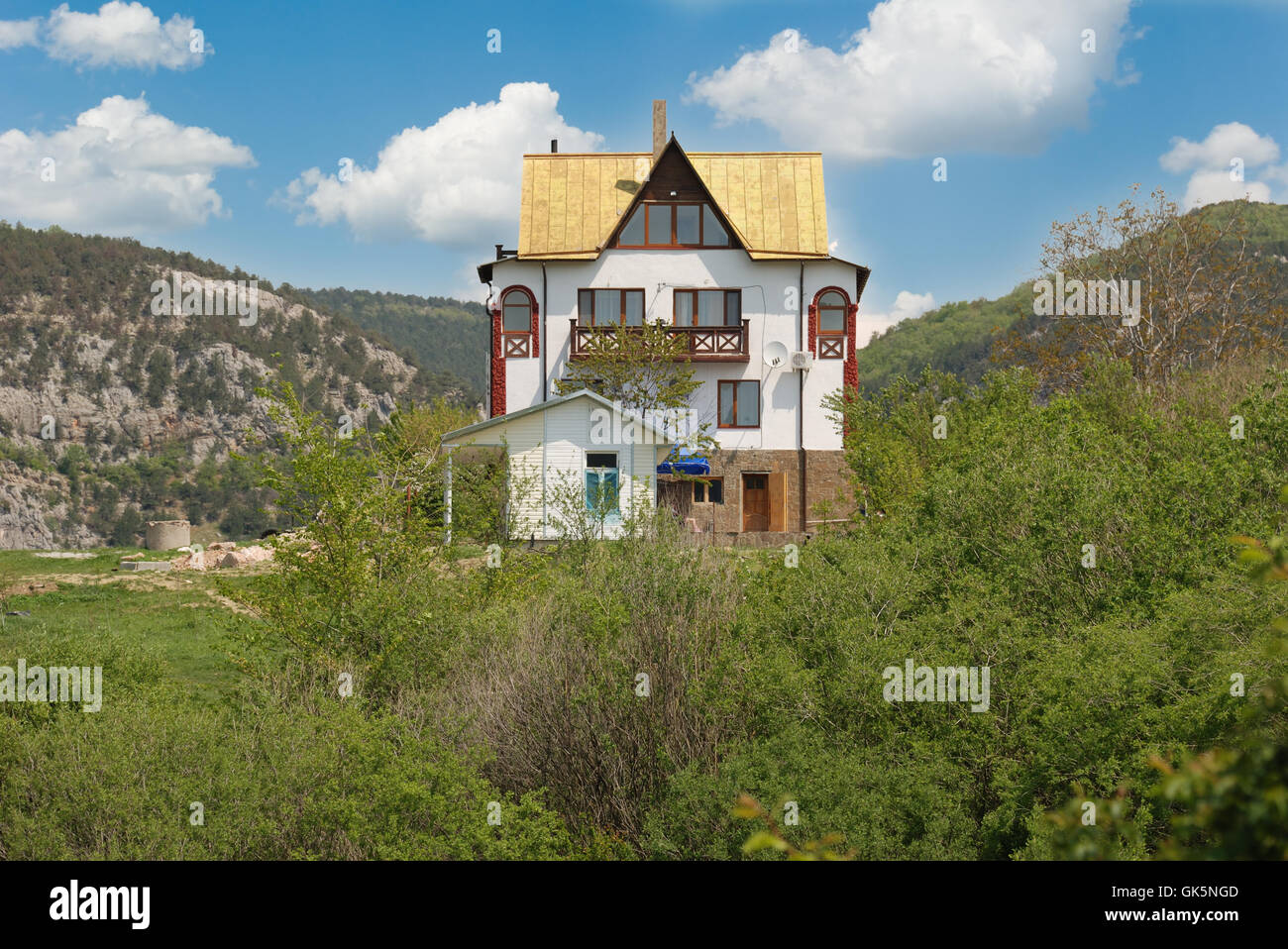 The house in a valley Stock Photo - Alamy