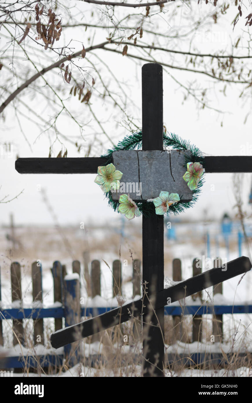 Cross on a cemetery Stock Photo - Alamy