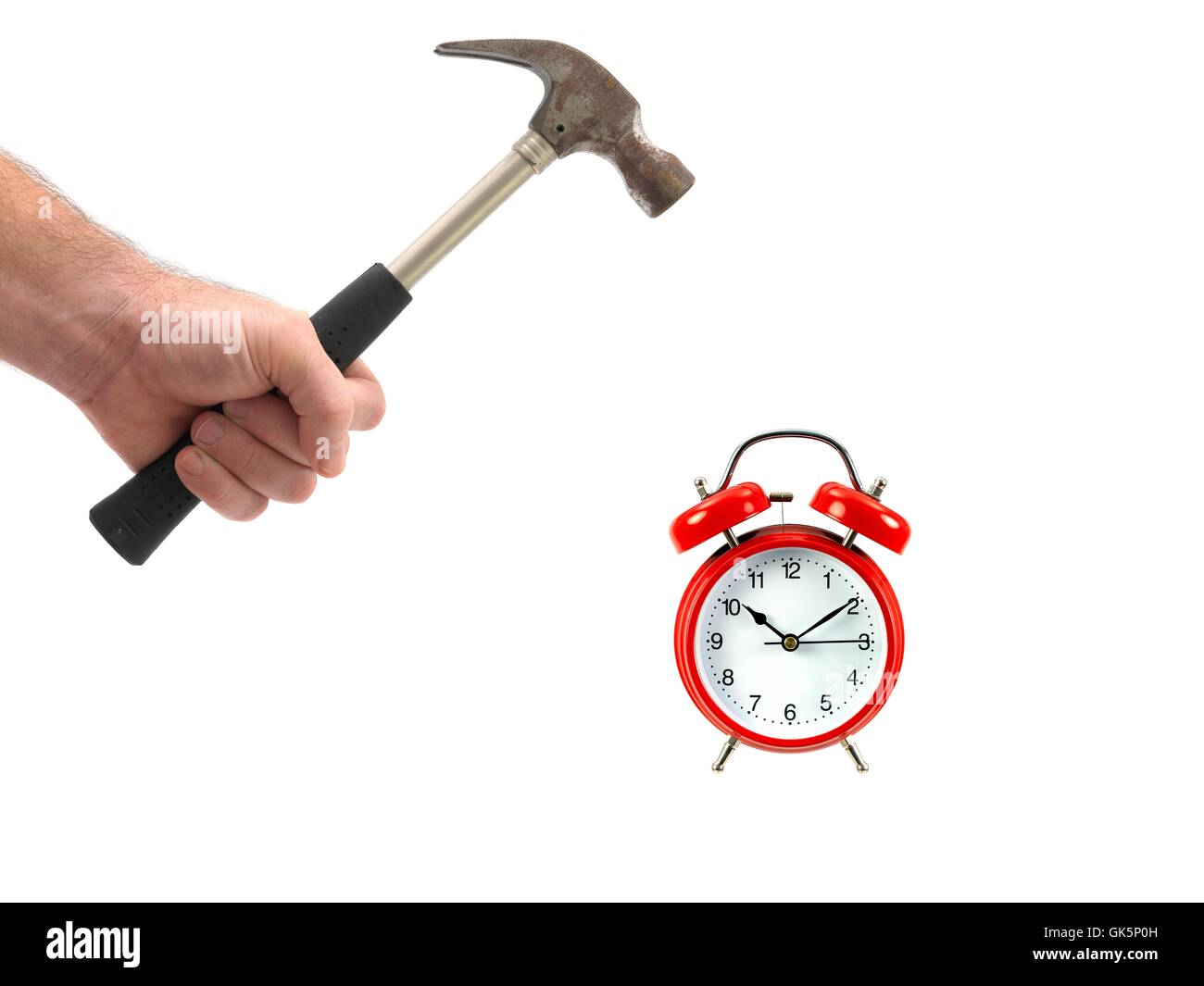 Smashing alarm clock hammer hi-res stock photography and images - Alamy