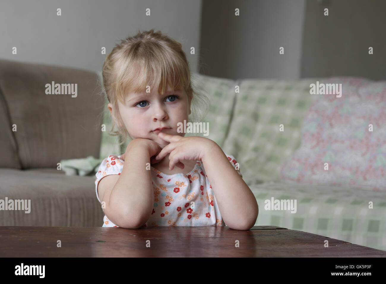 Little girl watching TV Stock Photo - Alamy