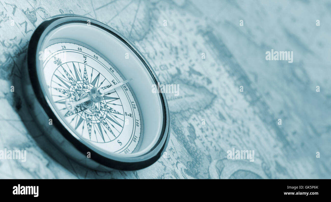 Old compass on ancient map Stock Photo - Alamy
