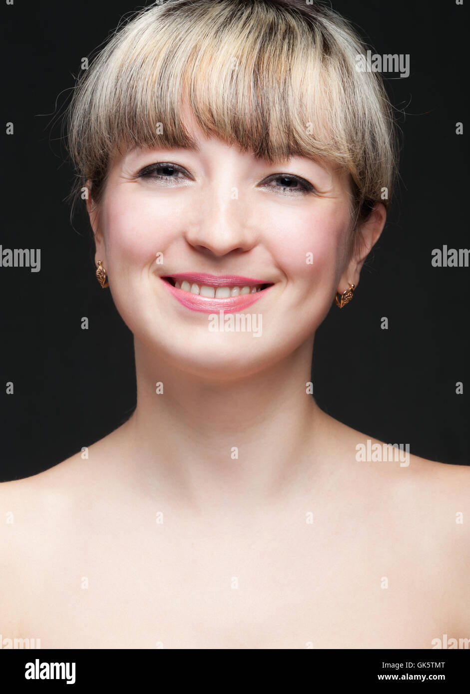 Portrait of the woman close up. The bared shoulders Stock Photo - Alamy