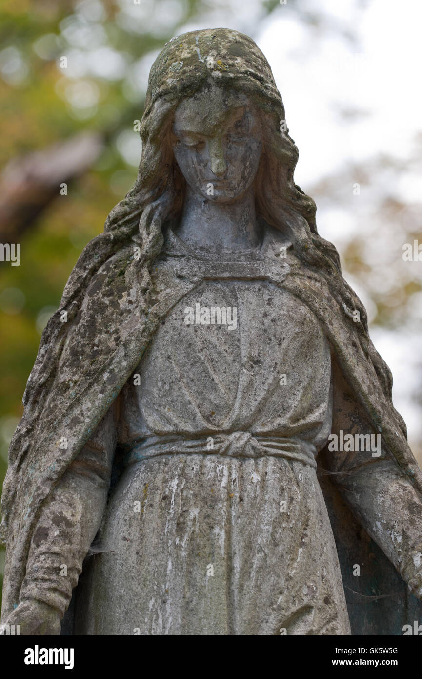 Monument Lady of Guadalupe on a cemetery Stock Photo - Alamy