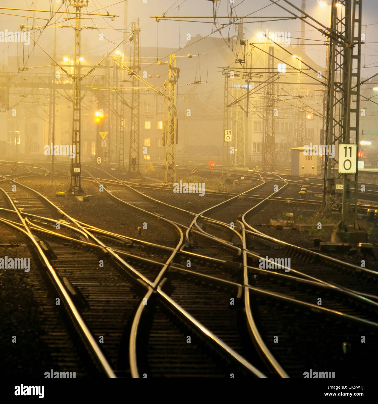 Confusing railway tracks at night Stock Photo - Alamy