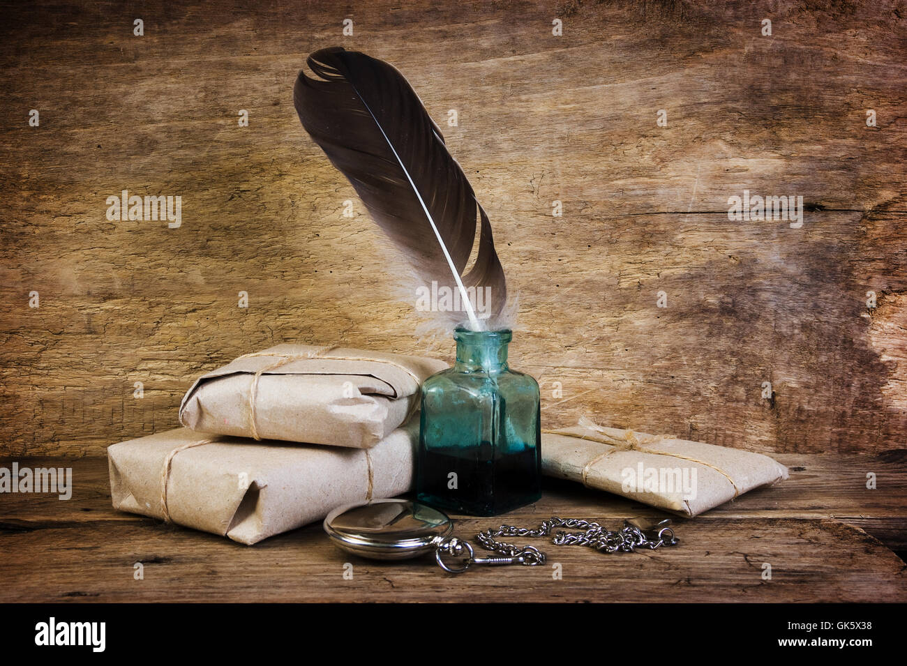 Postage on the background of board Stock Photo - Alamy