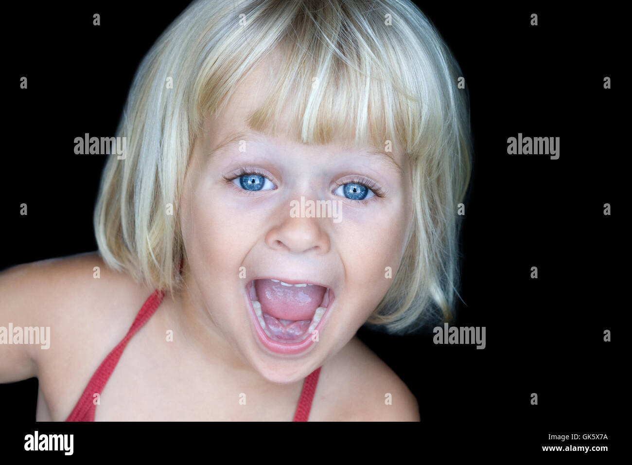 Little girl doing a funny face Stock Photo: 115071022 - Alamy