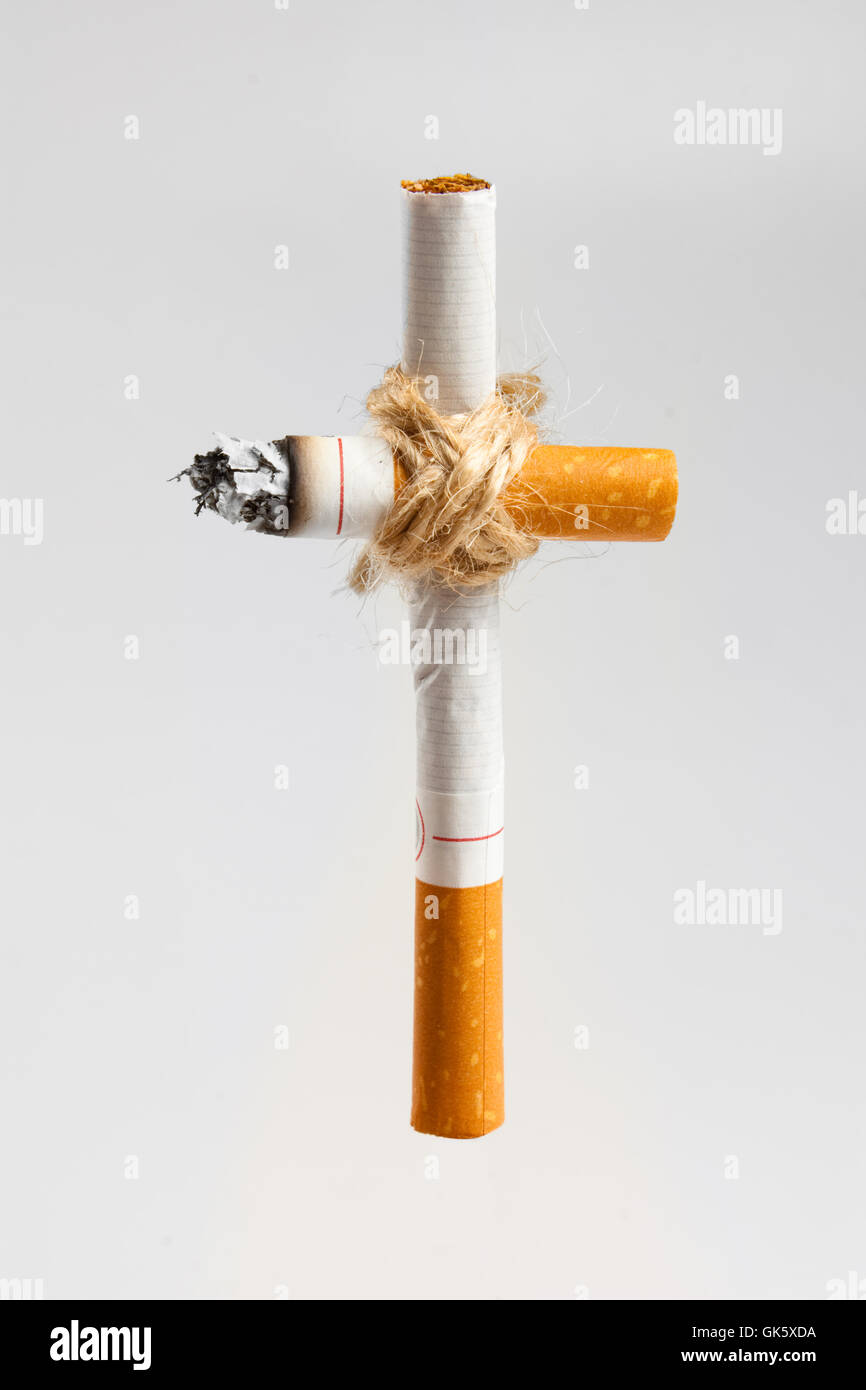 graveyard cross from cigarettes Stock Photo - Alamy