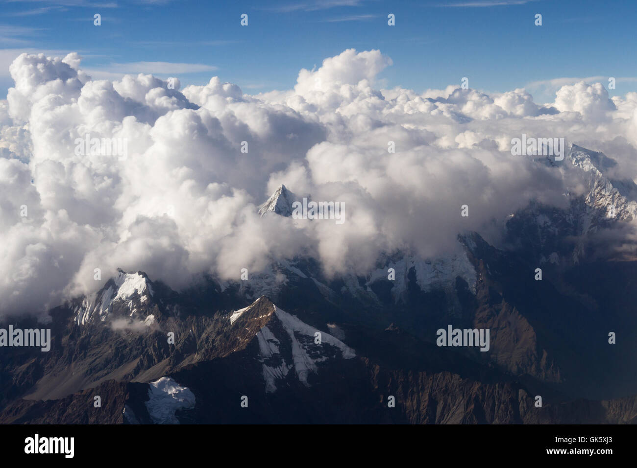 Peru - May 11 : Aerial view of the snow caped mountains of Peru from an ...
