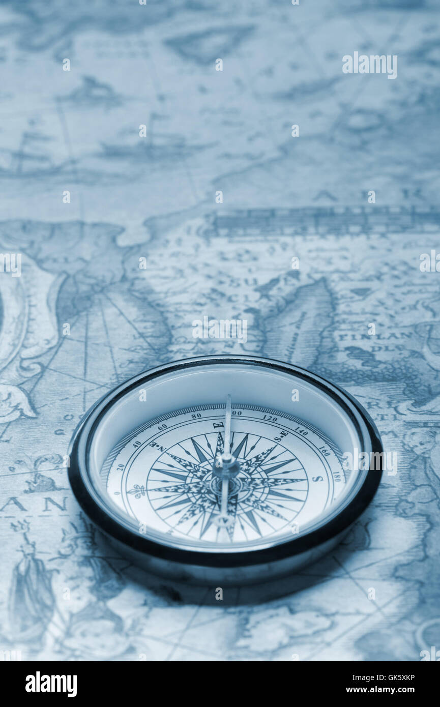 Old compass on ancient map Stock Photo - Alamy