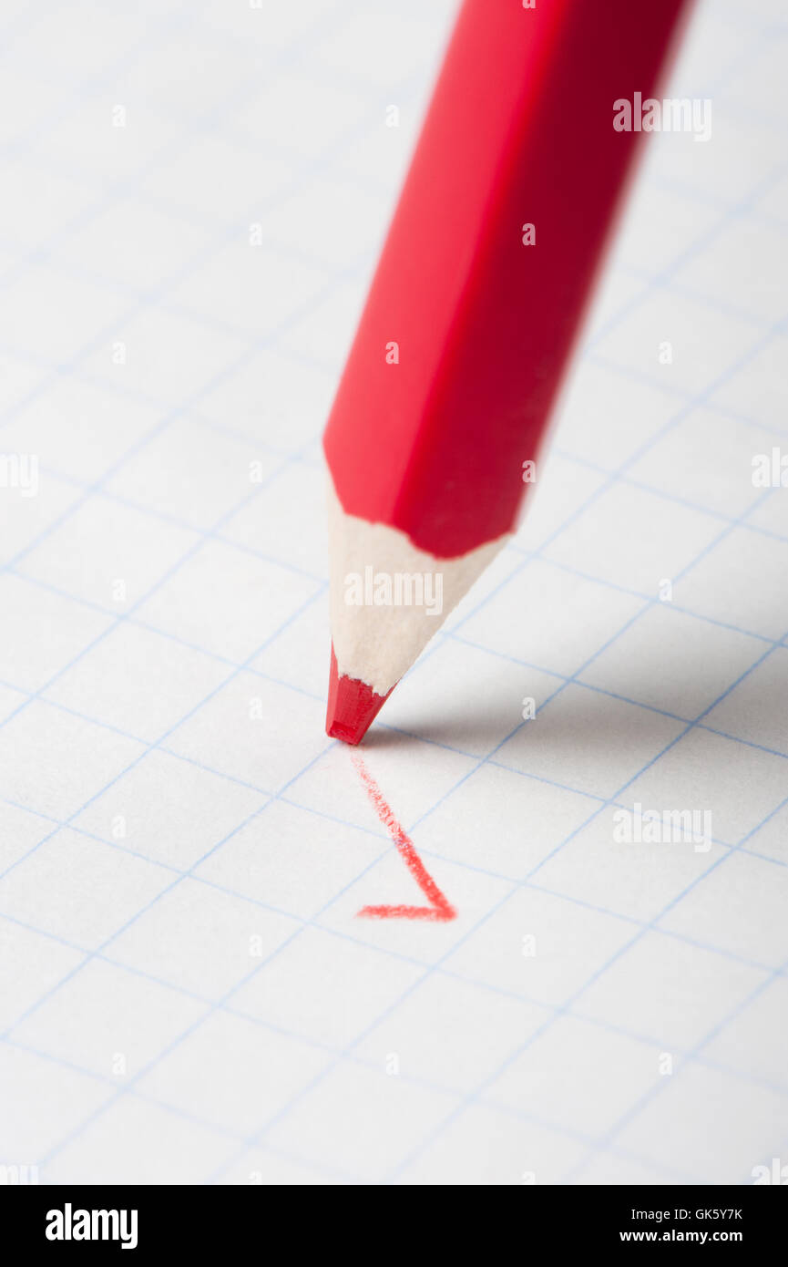 Red pencil writing a mark Stock Photo - Alamy