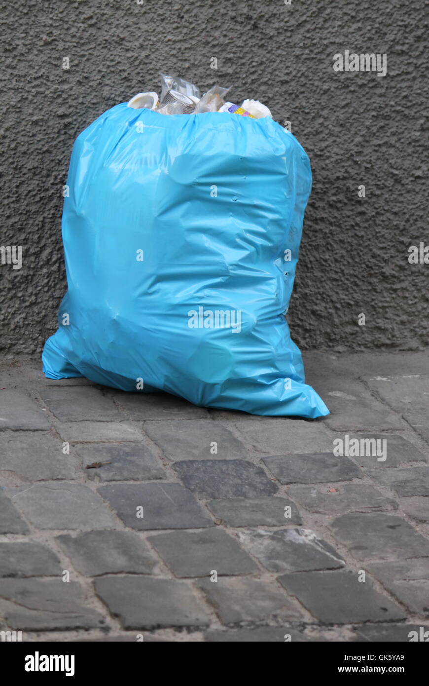 Blue garbage pack Stock Photo - Alamy
