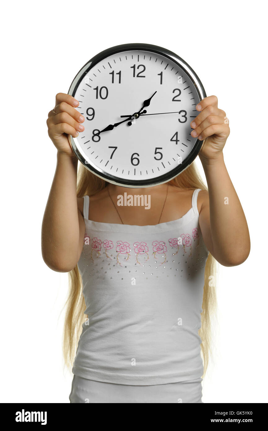 The girl with large clock Stock Photo - Alamy