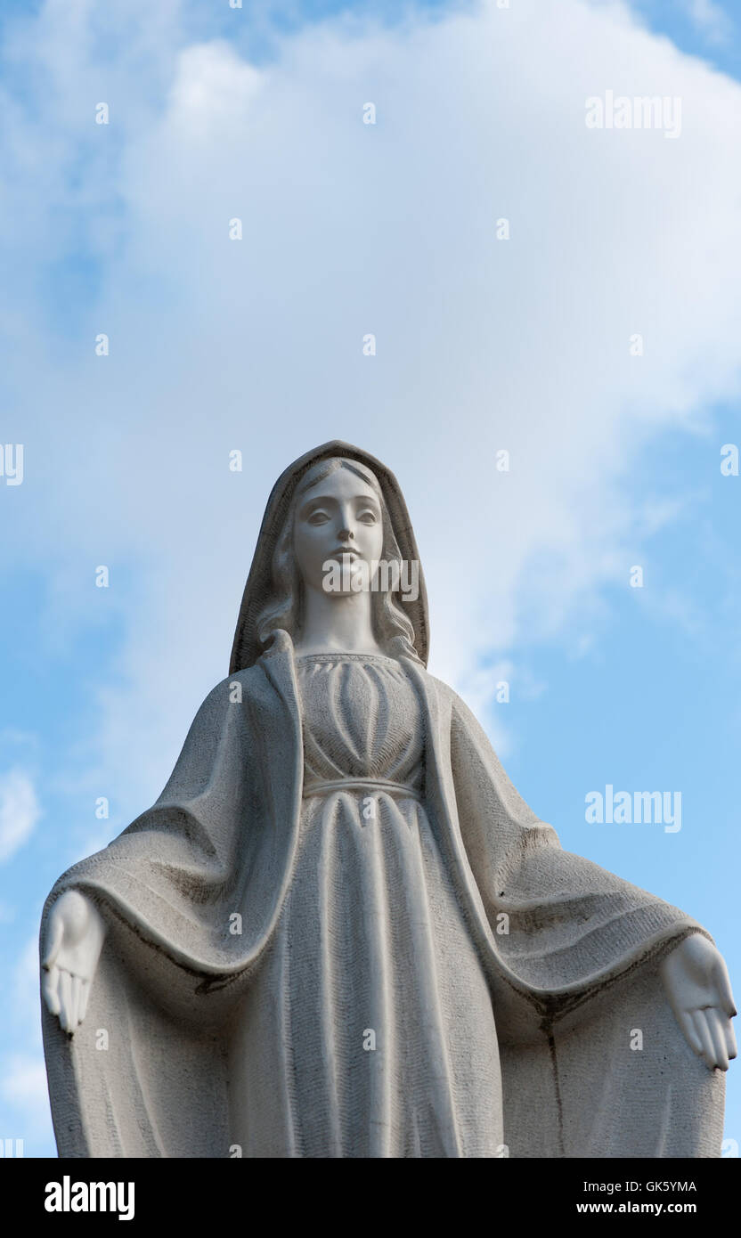 Monument Lady of Guadalupe on a cemetery Stock Photo - Alamy