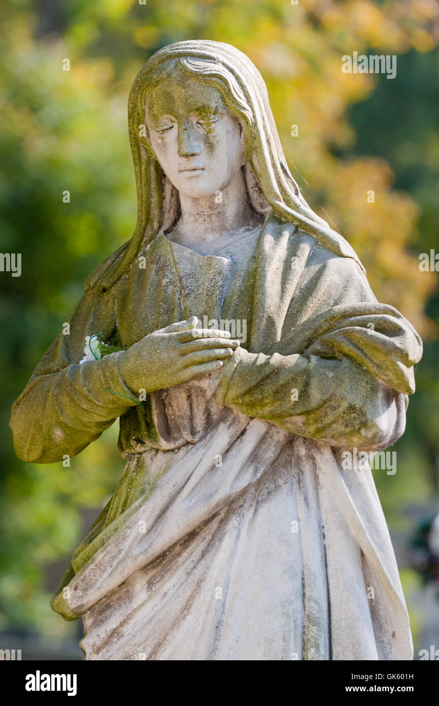Monument Lady of Guadalupe on a cemetery Stock Photo - Alamy