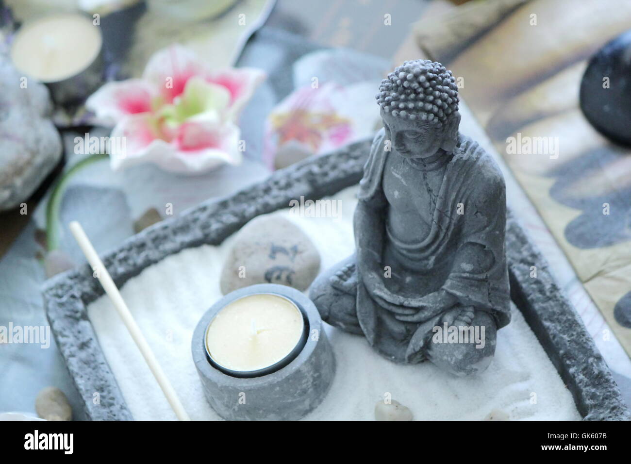 Zen buddha and table Stock Photo - Alamy