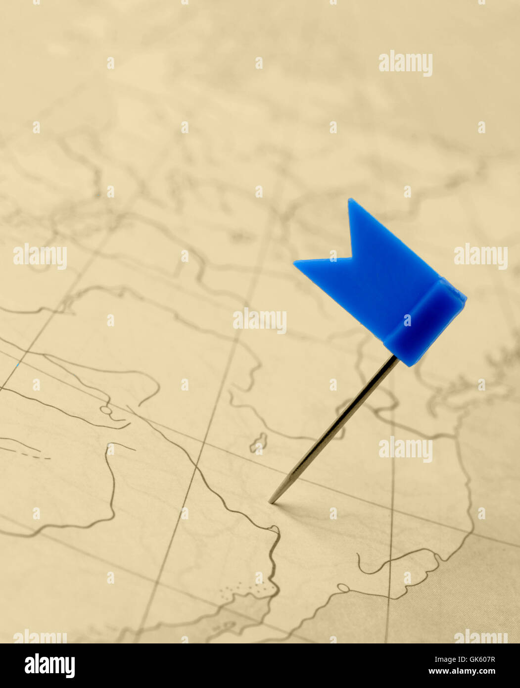 Flag blue a pin on old map Stock Photo - Alamy