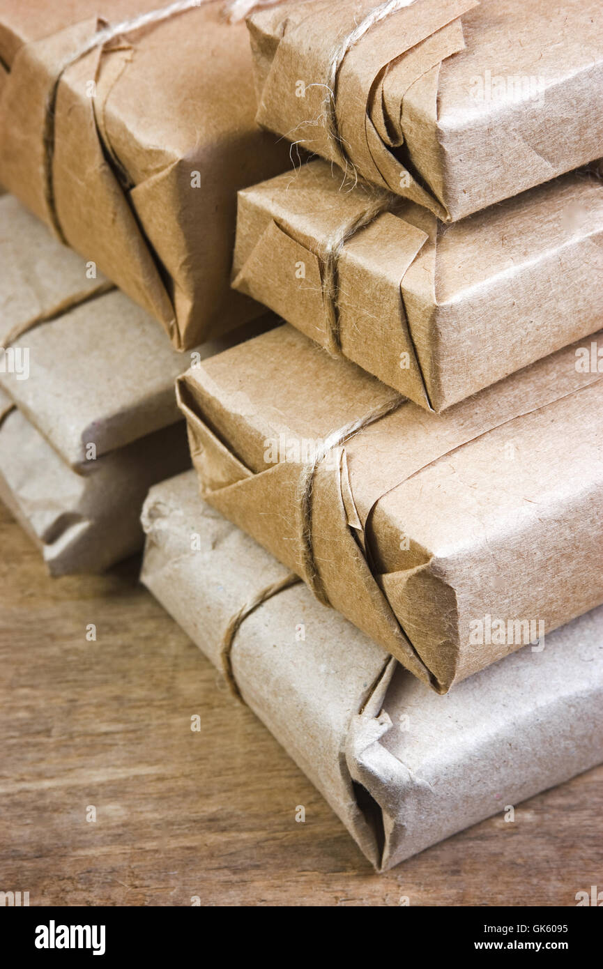 Postage on the background of an old board Stock Photo - Alamy