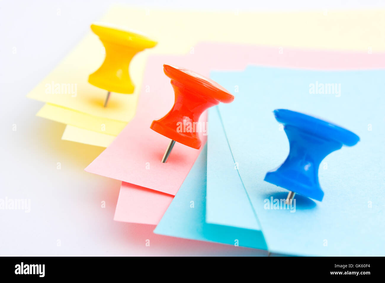 sheets pinned buttons Stock Photo - Alamy