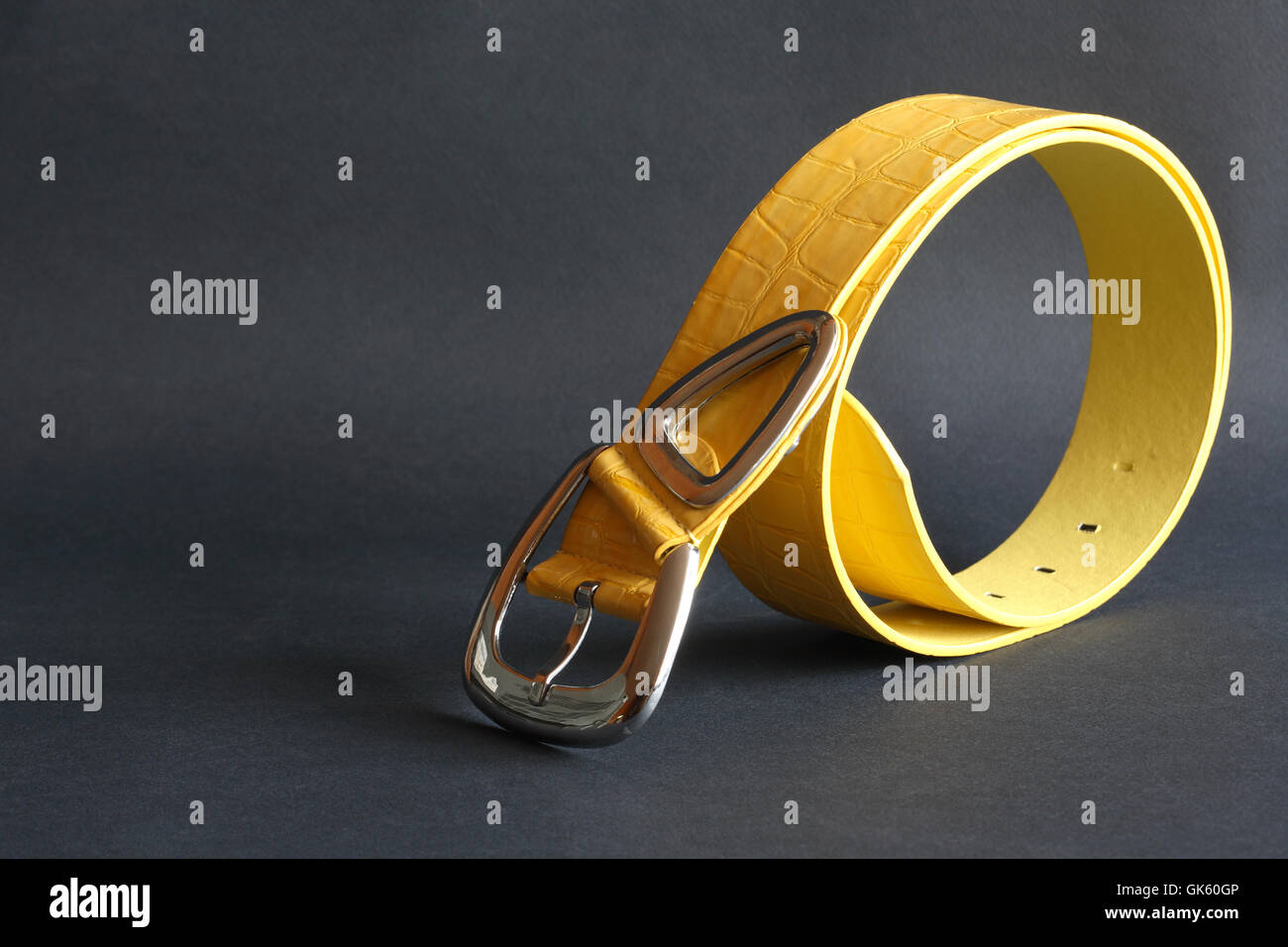 Yellow Belt On Dark Stock Photo - Alamy