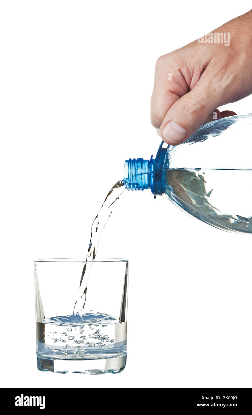 Water pouring from glass bottle Cut Out Stock Images & Pictures - Alamy