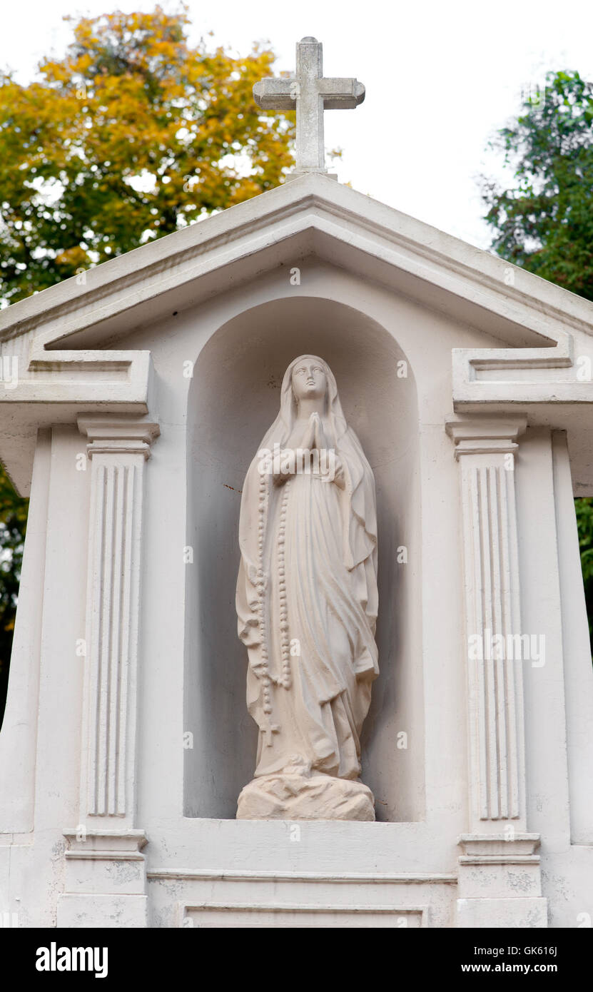 Monument Lady of Guadalupe on a cemetery Stock Photo - Alamy