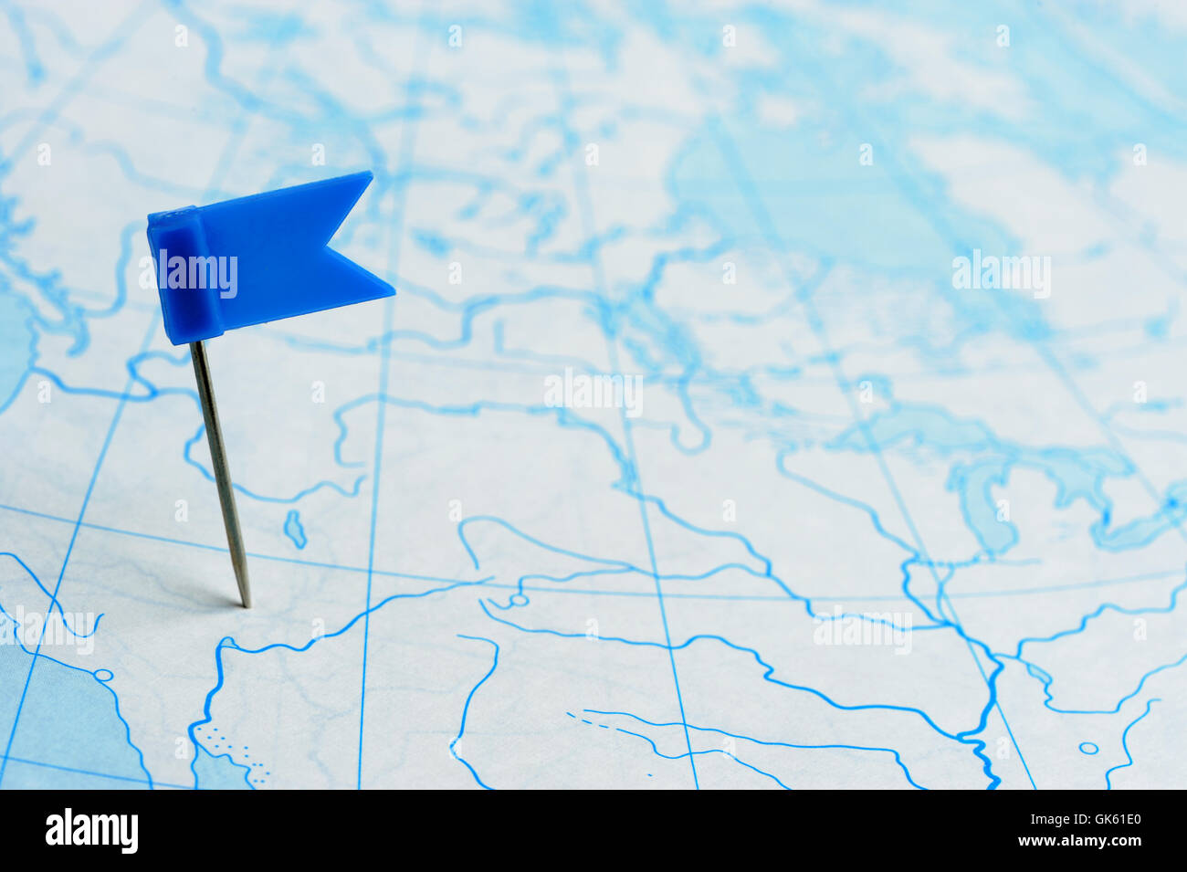 Flag blue a pin on blue map Stock Photo - Alamy