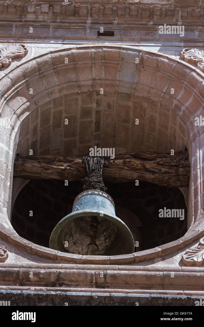 Bell hanging from wooden beam hi-res stock photography and images - Alamy