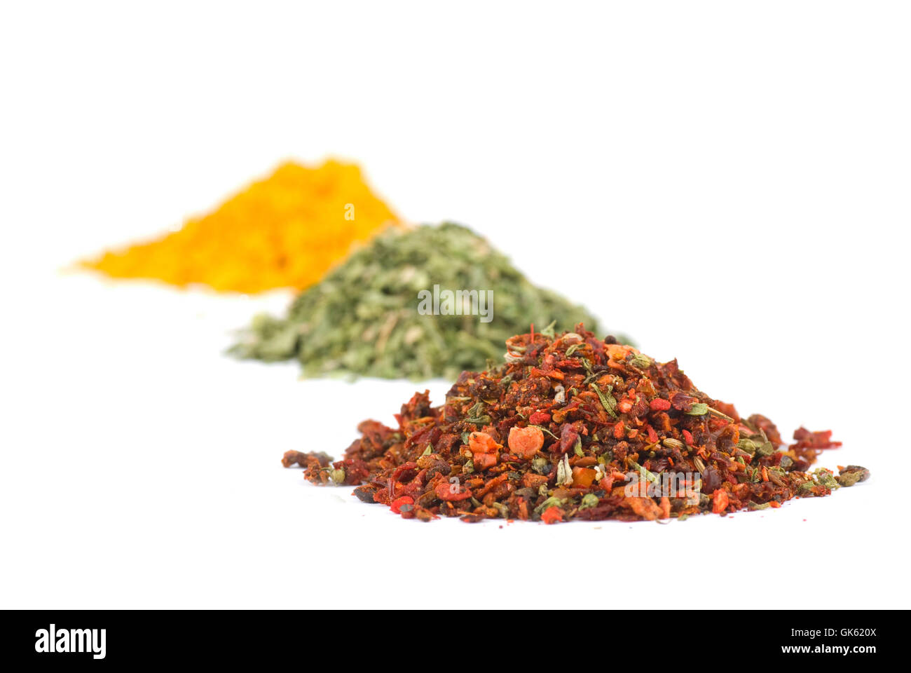 Heaps of various ground spices on white background Stock Photo - Alamy