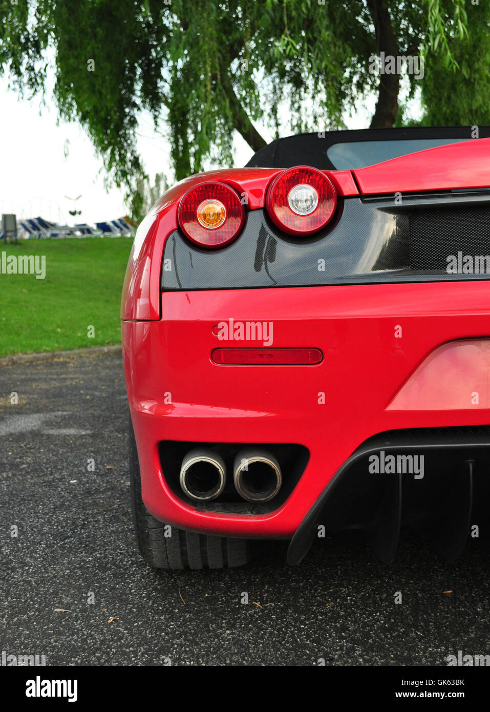 red car half rear Stock Photo - Alamy