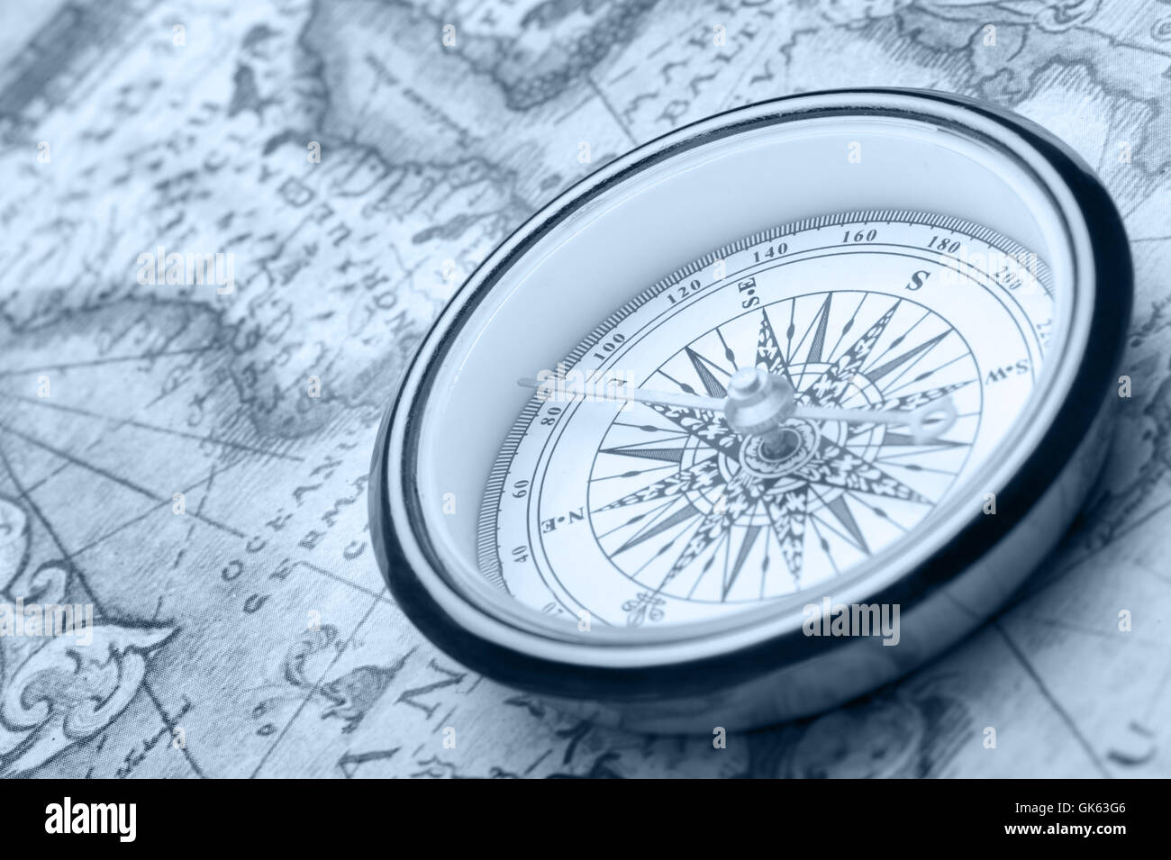 Old compass on ancient map Stock Photo - Alamy