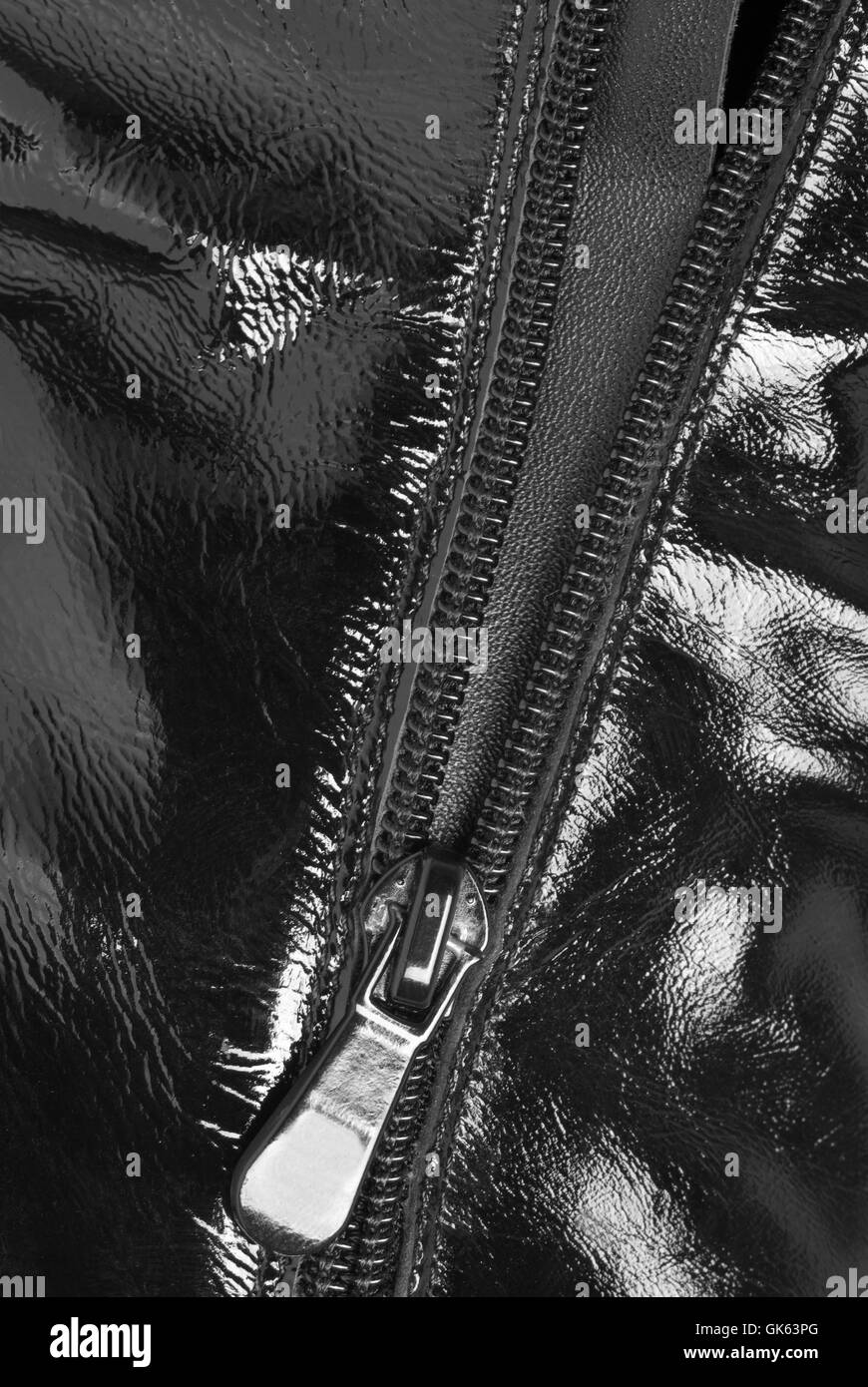 Closing zipper Black and White Stock Photos & Images - Alamy