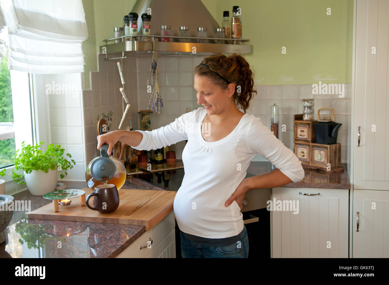 woman tea kitchen Stock Photo - Alamy