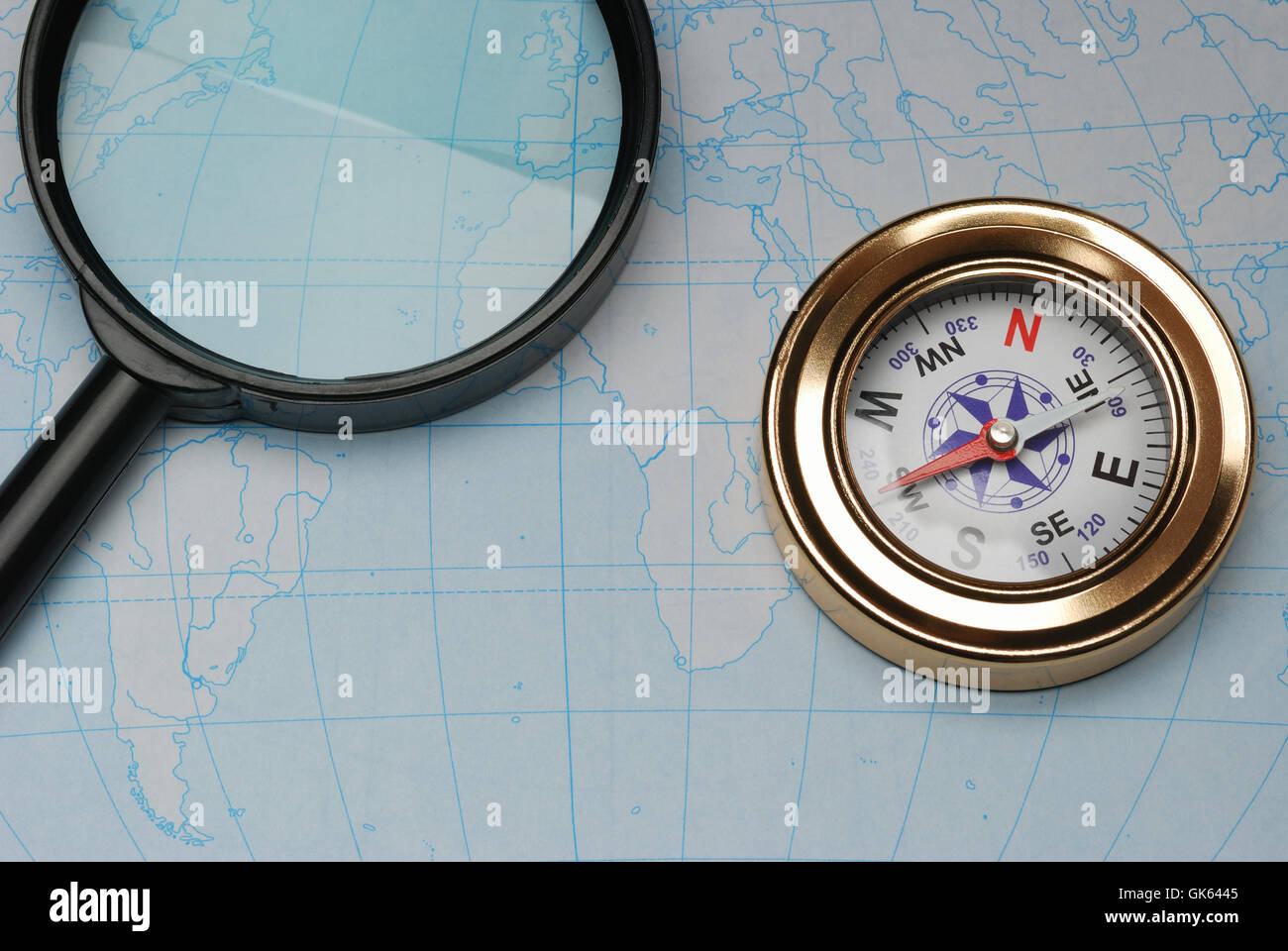 Compass and card Stock Photo - Alamy