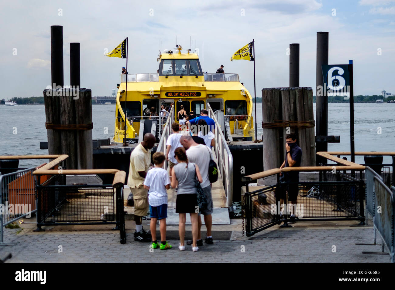 People boarding water taxi hi-res stock photography and images - Alamy