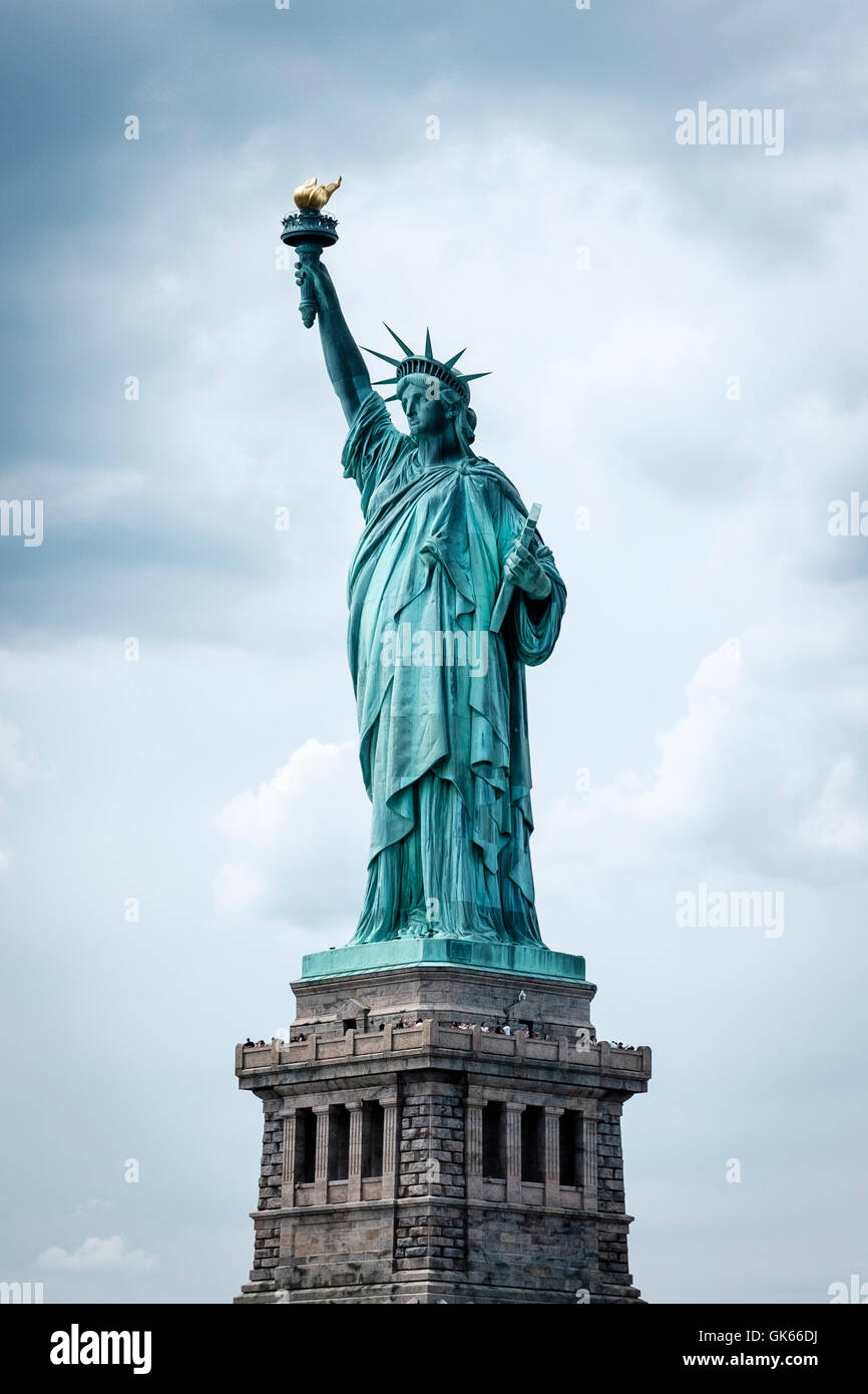 A three quarters front view of the Statue of Liberty in New York ...
