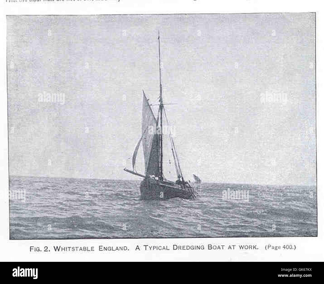 A typical dredging boat operates in the waters off Whitstable, England ...