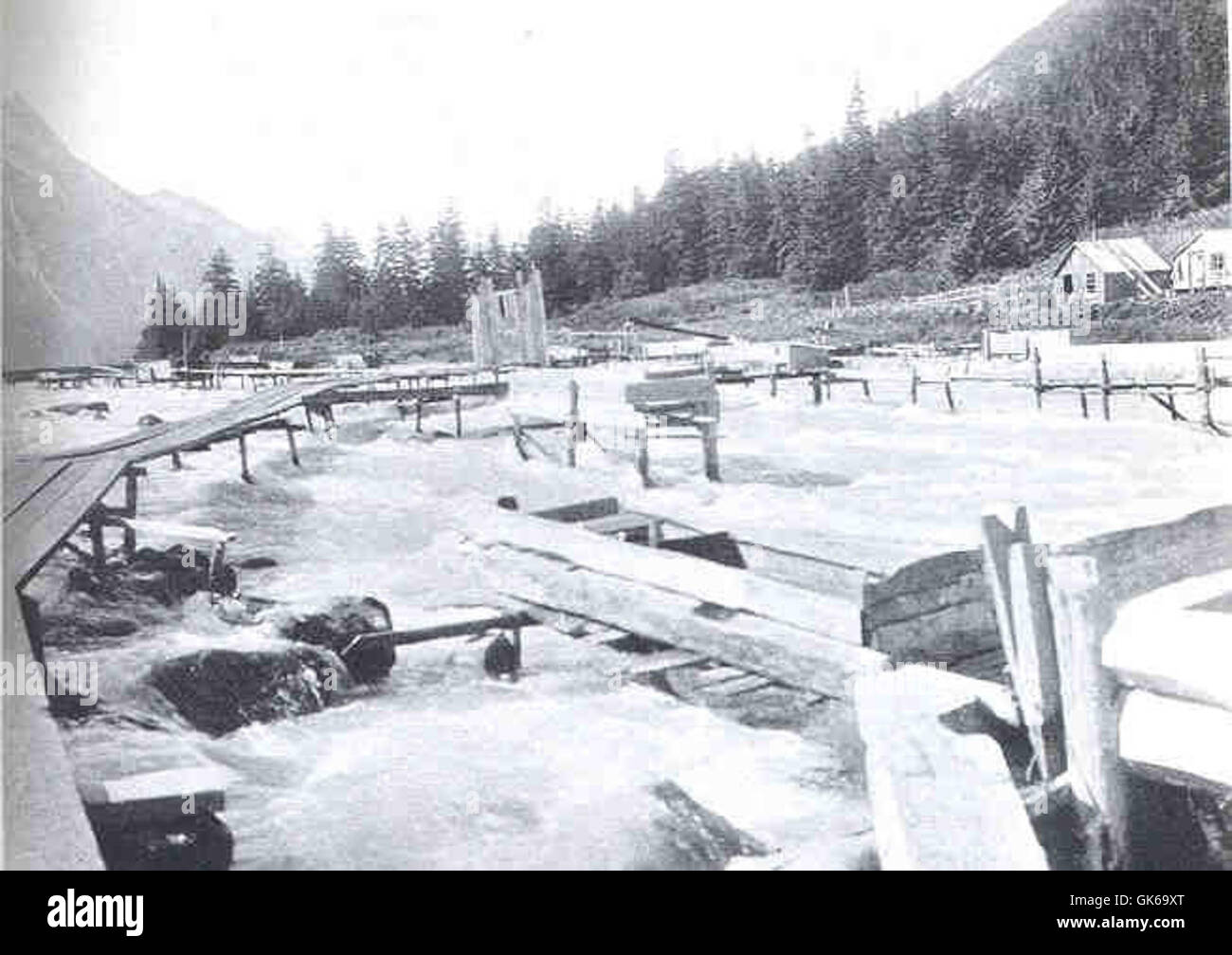 The image shows racks and runways used by Native Alaskan fishermen to ...