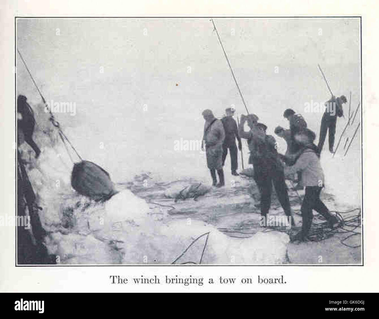 This image shows a winch used to bring a tow on board a ship. The winch ...