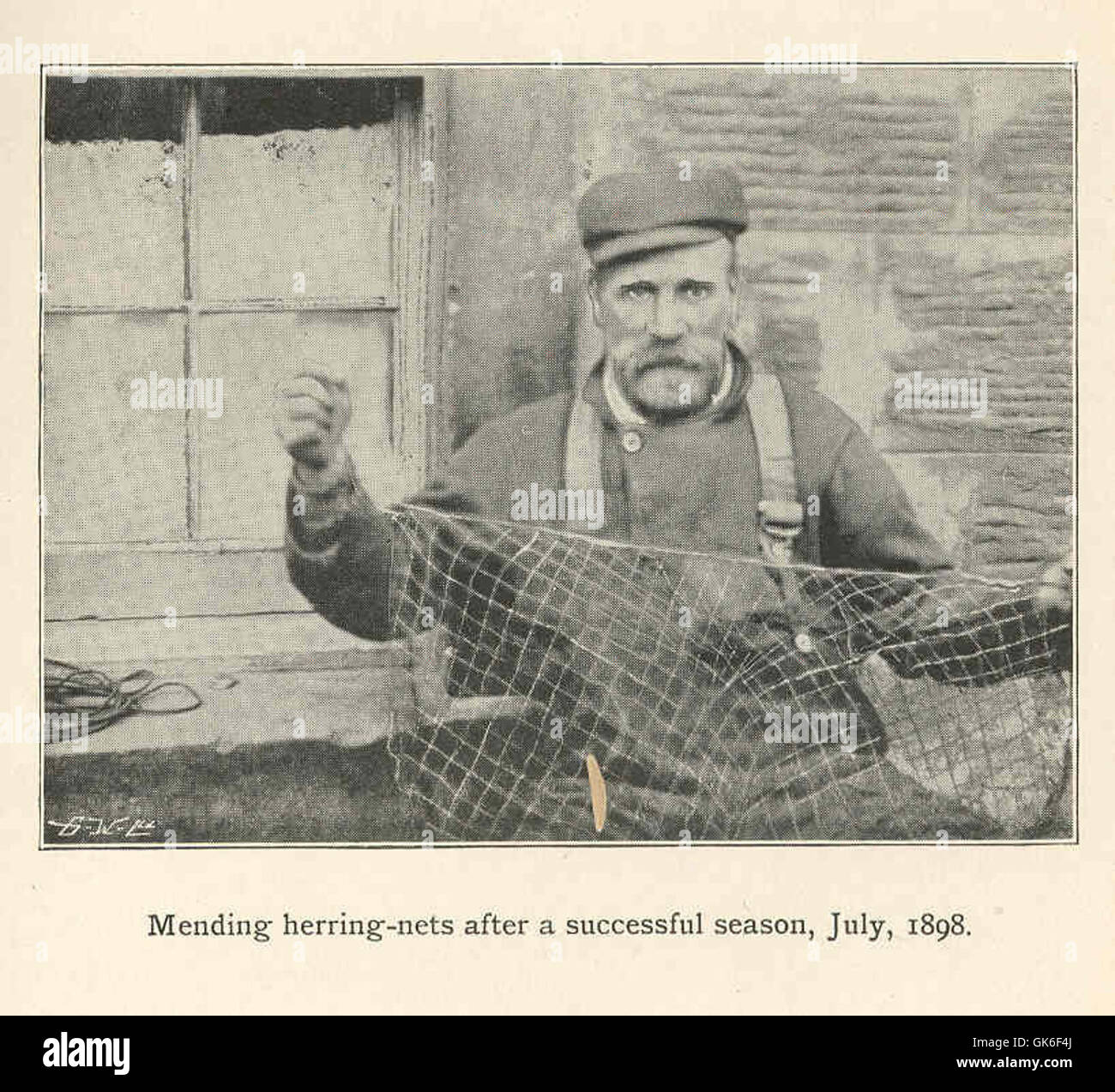 A scene from July 1898 depicting fishermen mending herring nets after a ...